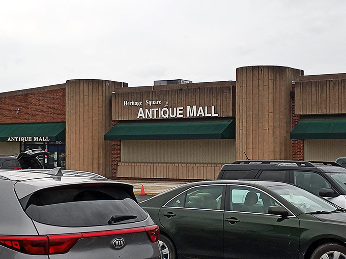 Behind this unassuming wooden fa&ccedil;ade lies a wonderland of treasures waiting to be discovered at Heritage Square Antique Mall.