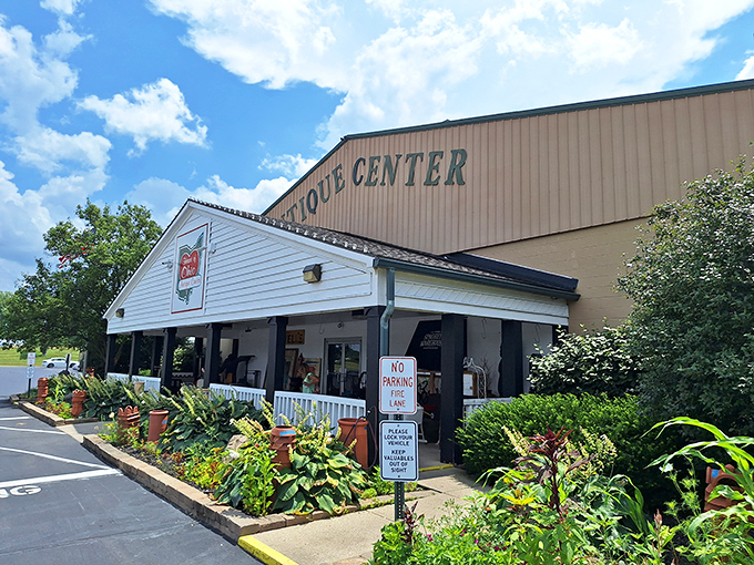 The welcoming front porch of Heart of Ohio Antique Center beckons like a Southern grandmother who just baked pie. Those hanging plants aren't just decoration&mdash;they're a promise of homespun treasures inside.