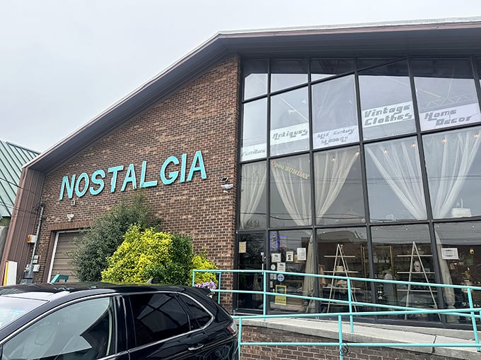 The turquoise sign of Nostalgia beckons like a neon-lit portal to the past. This brick building houses more memories per square foot than your grandmother's attic.