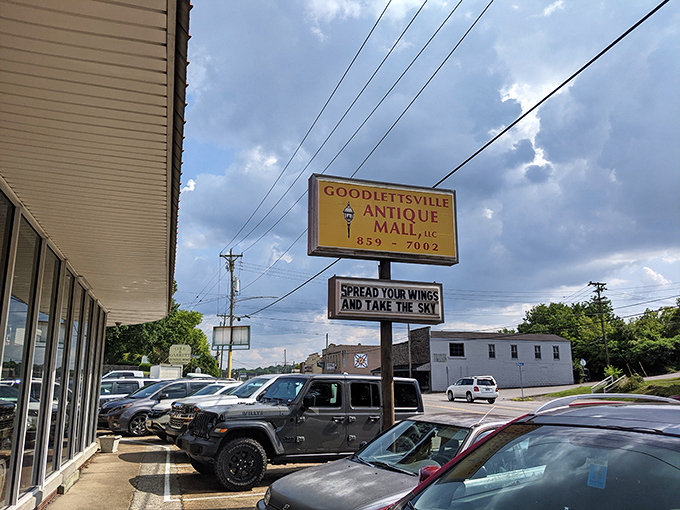 The iconic yellow sign promises treasure hunting at its finest. "Spread Your Wings and Take the Sky" &ndash; advice worth following before diving into this vintage wonderland.