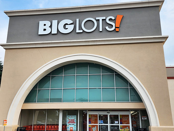 The iconic Big Lots storefront in Kettering beckons with its distinctive arched entrance&mdash;like a cathedral dedicated to the religion of savings.