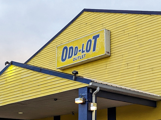 The bright yellow exterior of Odd-Lot Outlet stands out like a beacon of hope for bargain hunters in Tannersville's retail landscape.