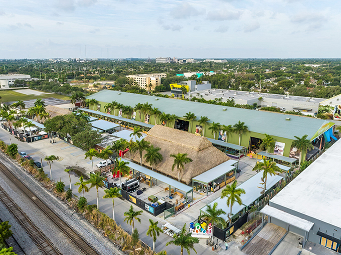 The sprawling oasis of Yellow Green Farmers Market stands like a culinary kingdom in Hollywood, Florida, where palm trees stand guard over gastronomic treasures.