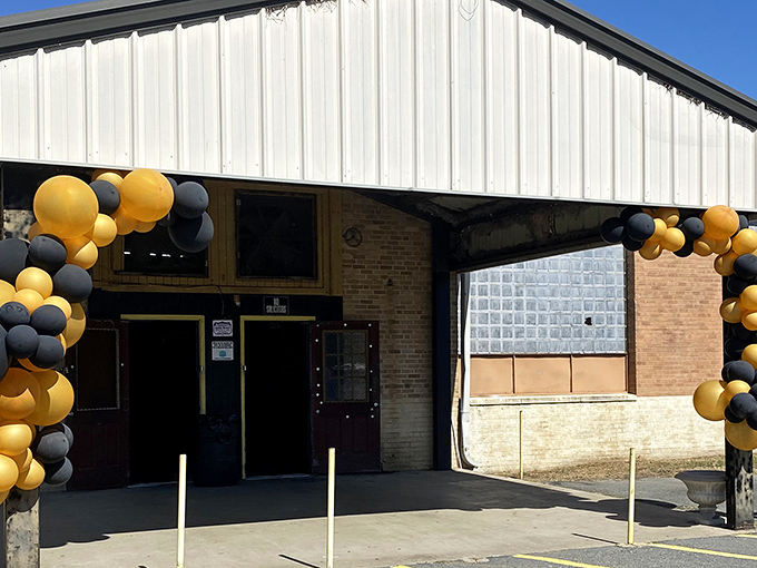 The unassuming entrance to Pine Crest, festooned with black and gold balloons, promises treasures that big box stores can only dream about.
