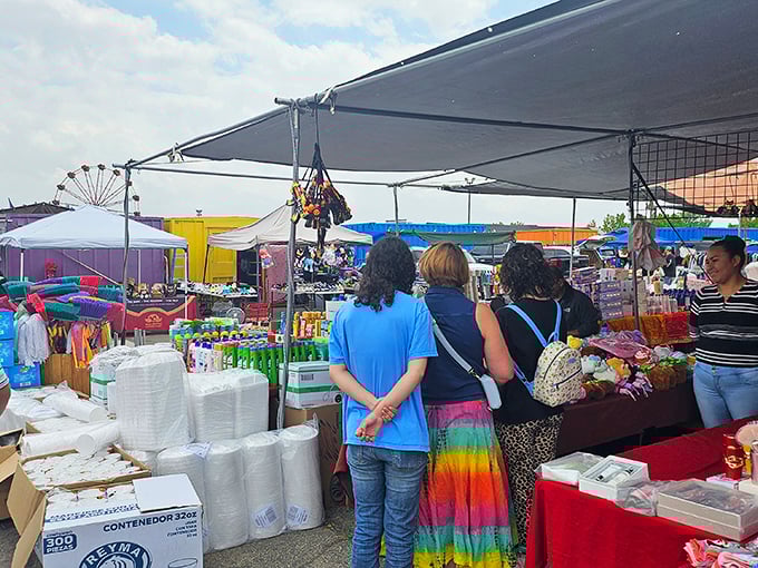 Shoppers browse colorful stalls under blue Colorado skies &ndash; the Mile High Flea Market's weekend bustle is a treasure hunter's paradise.