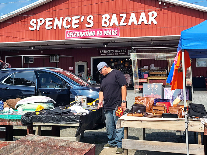 The red barn facade promises treasures within, like a rustic Amazon warehouse run by folks who actually smile.
