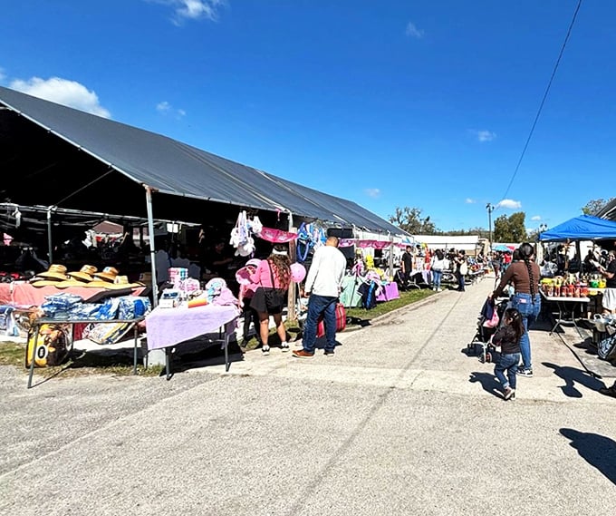 The treasure hunter's paradise unfolds under Florida's blue skies, where colorful plastic bins overflow with possibilities and every aisle promises discovery.