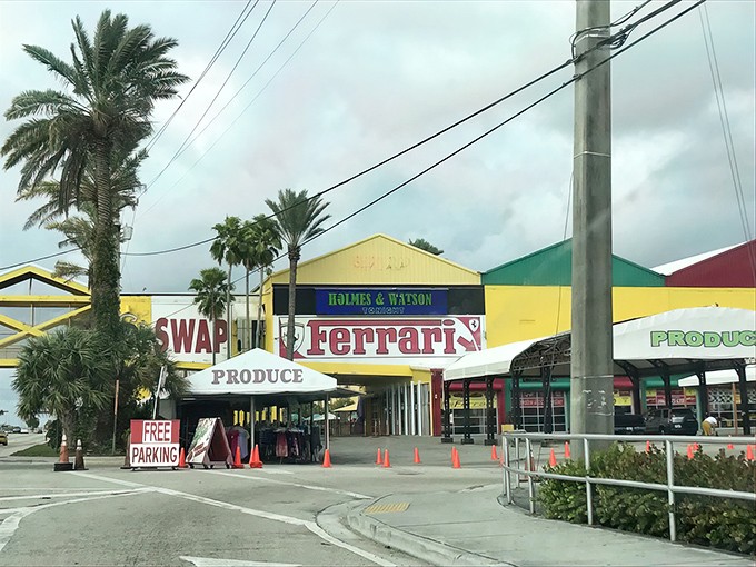 The colorful entrance to the Swap Shop promises a retail adventure where "Ferrari" and "Produce" share equal billing – only in Florida!