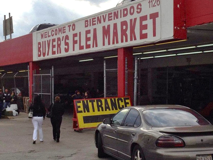 The iconic red and white entrance sign welcomes bargain hunters with bilingual hospitality. Like the pearly gates of retail paradise, but with better prices.