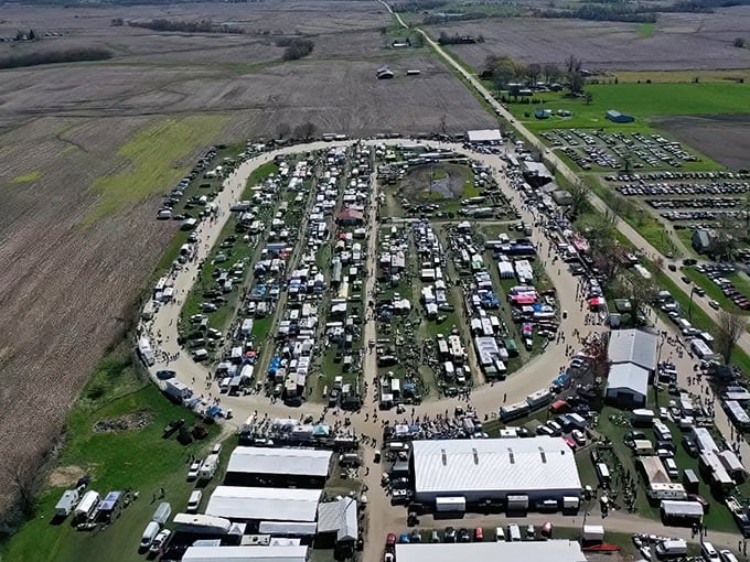An aerial view that reveals the true scale of What Cheer Flea Market&mdash;like a small city dedicated entirely to the art of the deal.