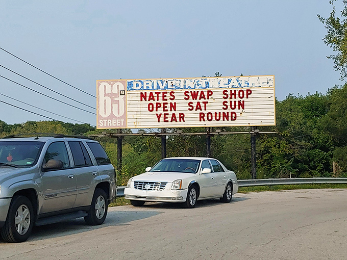 A classic roadside sign welcomes treasure hunters to Nate's Swap Shop in Kansas City - a year-round haven for bargain lovers and vintage seekers alike!