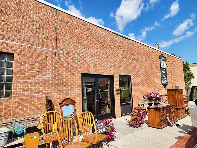 The brick facade of Junktion welcomes treasure hunters with wooden furniture previews basking in the Nebraska sunshine&mdash;a appetizer before the main course inside.