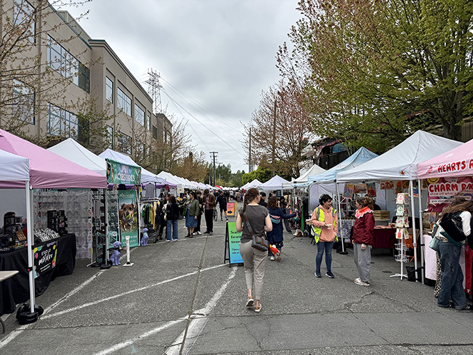 White tents line the street like a treasure hunter's yellow brick road. Every Sunday, bargain seekers navigate this maze of possibilities in Seattle's quirkiest neighborhood.