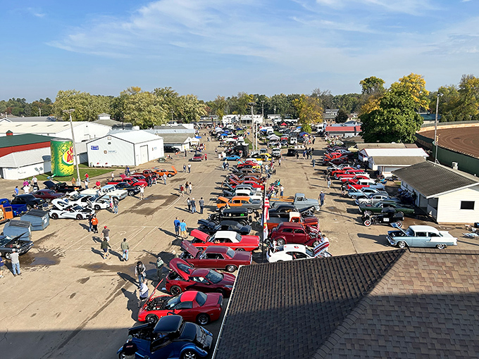 A bird's-eye view of automotive heaven! Classic cars line up at the Shawano Flea Market, where chrome dreams and vintage wheels find new admirers every Sunday.