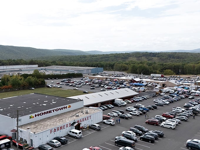 From this aerial view, you can appreciate the scale of Wednesday's pilgrimage. Cars fill the lot like bargain-hunters fill their shopping bags&mdash;completely.