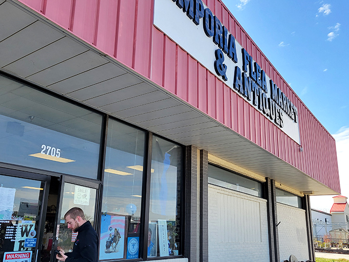 The pink-trimmed facade of Emporia Flea Market & Antiques doesn't scream "architectural marvel," but inside lies a treasure hunter's paradise waiting to be explored.