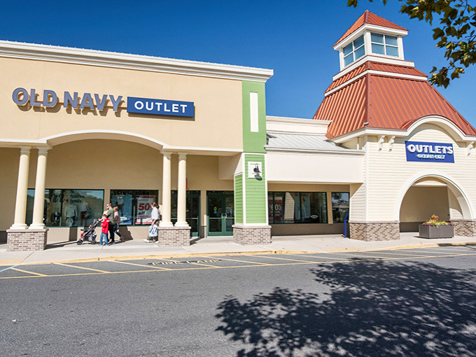 The coastal-inspired architecture of Outlets Ocean City welcomes bargain hunters with its distinctive lighthouse tower and inviting storefronts, promising retail adventures beyond the boardwalk.