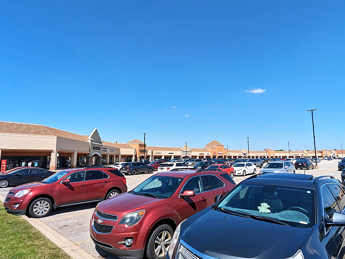 The retail promised land awaits! Birch Run Premium Outlets stretches as far as the eye can see, with packed parking lots hinting at the treasures within.