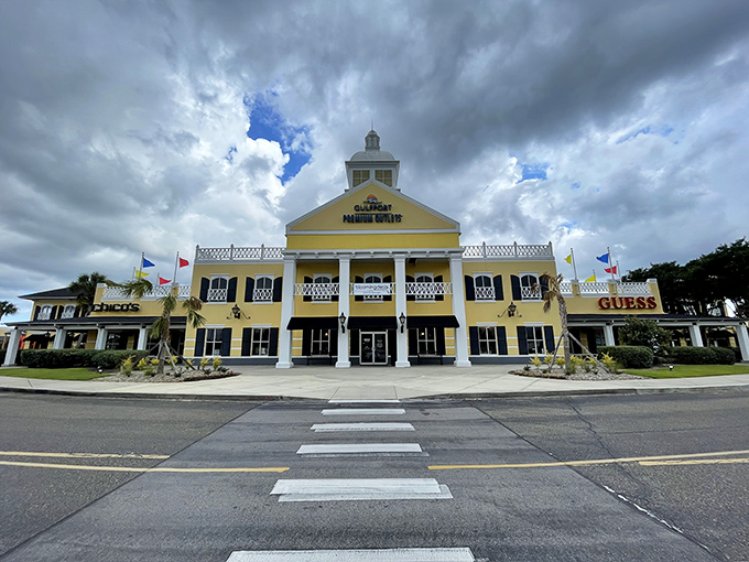 The grand colonial-style entrance of Gulfport Premium Outlets stands like a Southern mansion that accidentally swallowed a shopping mall&mdash;and we're all better for it.