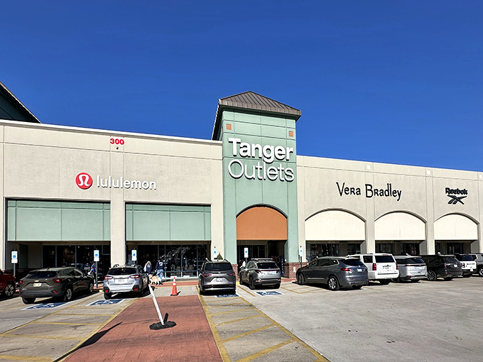 The retail promised land beckons with its clean lines and signature teal accents. Lululemon and Vera Bradley stand ready to welcome your wallet with open arms.