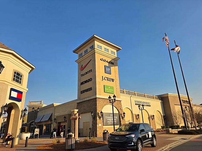 Brand names that normally require a small loan suddenly become attainable at Charlotte Premium Outlets. The towering directory sign is basically a monument to savings.