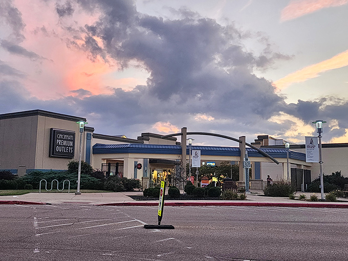 The sunset casts a magical glow over Cincinnati Premium Outlets, transforming an ordinary shopping trip into what feels like a retail fairy tale.