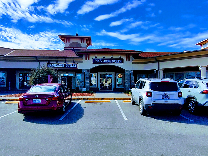 The colonial-style architecture of Tanger Outlets Sevierville welcomes shoppers with the promise of retail therapy under Tennessee's brilliant blue skies.