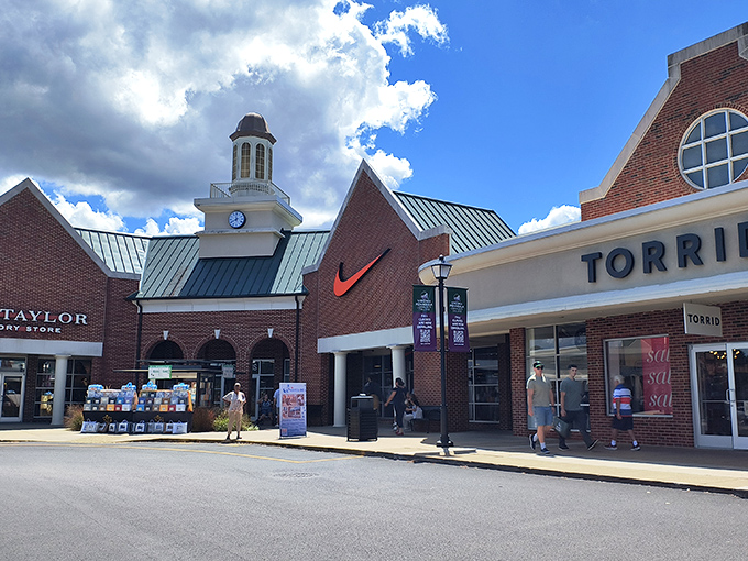 The colonial-inspired architecture of Williamsburg Premium Outlets makes bargain hunting feel almost historically significant. That clock tower isn't just keeping time&mdash;it's counting down to your next great deal.