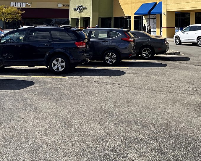The colorful storefronts of Johnson Creek Premium Outlets welcome bargain hunters like a retail oasis in the Wisconsin landscape.