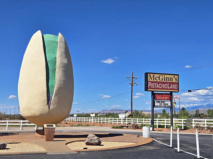 The world's most ambitious pistachio stands proudly against the New Mexico sky, proving that sometimes size really does matter in the roadside attraction game.