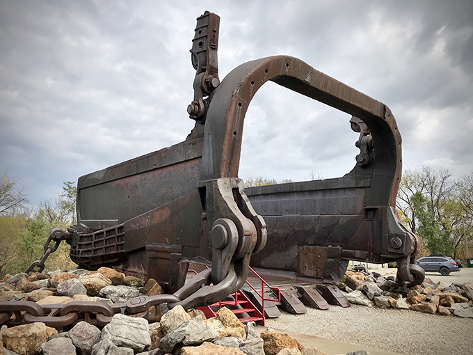Standing before this rusted colossus, you can't help but feel like an ant at a giants' picnic. The Big Muskie Bucket dwarfs human visitors with industrial majesty.