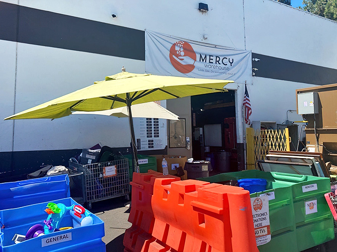 The unassuming exterior of Mercy Warehouse in Laguna Niguel hides a treasure trove of secondhand gems waiting to be discovered.