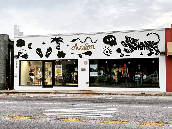 Avalon Exchange's storefront is like a fashion portal guarded by a whimsical tiger and palm tree &ndash; secondhand shopping with first-rate personality.