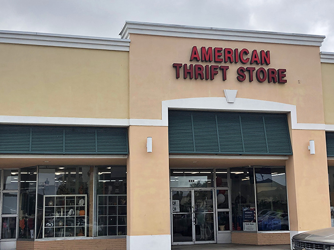 The peach-colored facade with bold red lettering promises treasure hunting adventures within. Florida's bargain paradise awaits behind these doors.