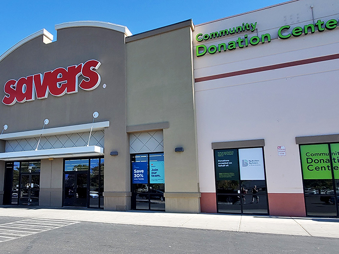 The iconic red Savers sign beckons like a lighthouse for treasure hunters navigating the sea of secondhand possibilities in Albuquerque.