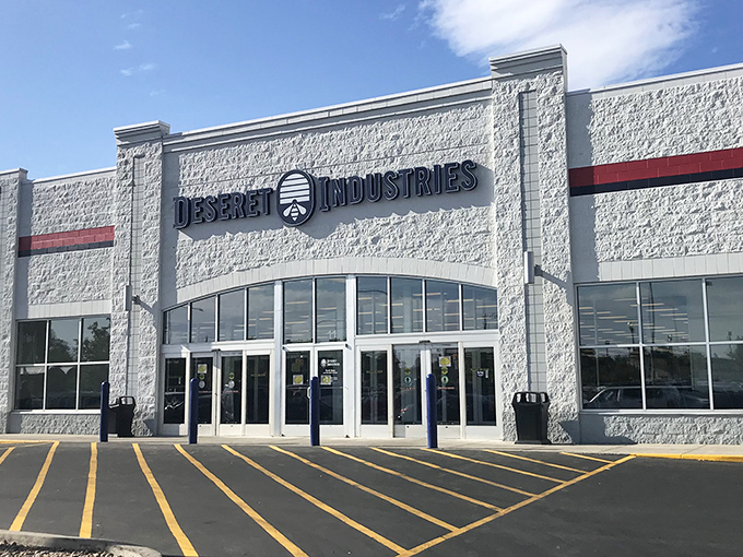 The iconic white facade of Deseret Industries gleams against Utah's blue sky, a beacon for bargain hunters with dreams bigger than their budgets.