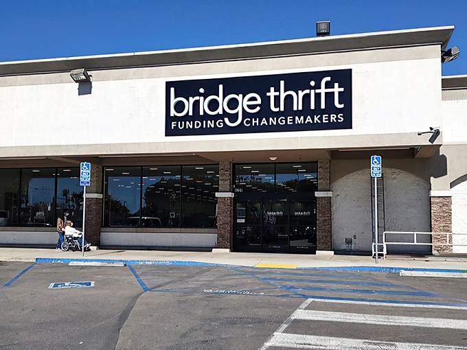 Holiday banners and a welcoming facade create the perfect disguise for what's really inside: a bargain paradise where wallets breathe easier and shopping carts fill mysteriously.