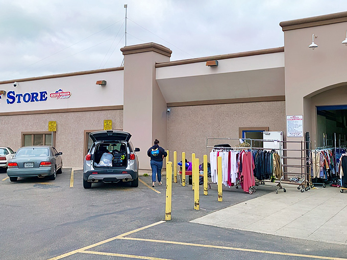 Outside the Super Thrift Store, where bargain hunters unload their treasures like archaeologists returning from a particularly fruitful dig. The real California gold rush happens here daily.