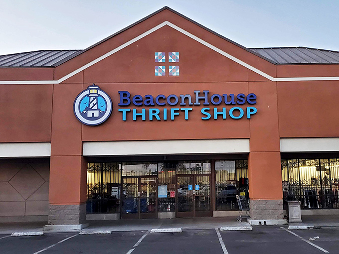 The terra cotta facade of Beacon House Thrift Shop stands like a lighthouse for bargain hunters, promising treasures within that won't sink your budget.