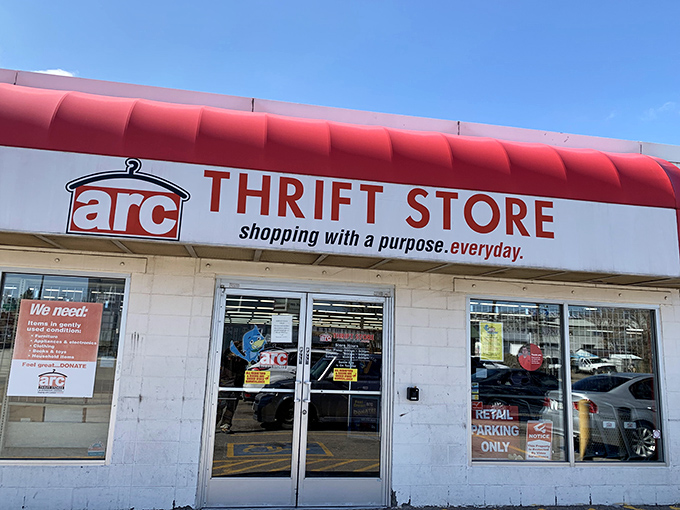 The iconic red awning of arc Thrift Store beckons bargain hunters with its "shopping with a purpose" promise &ndash; retail therapy that actually helps others.
