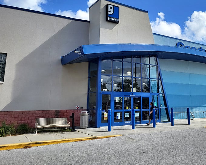The blue-accented entrance to Goodwill Brandon Superstore stands like a portal to bargain paradise, beckoning treasure hunters with promises of undiscovered gems.