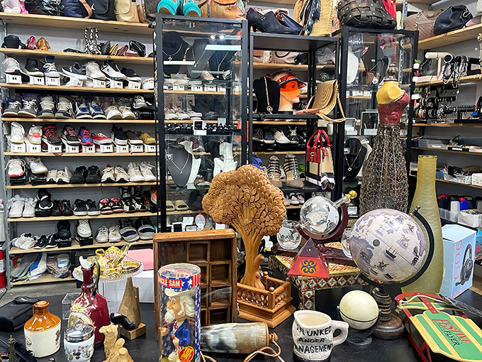 Treasure hunter's paradise! Rows of shoes and collectibles create a retail archeological dig where discoveries await behind every display case.