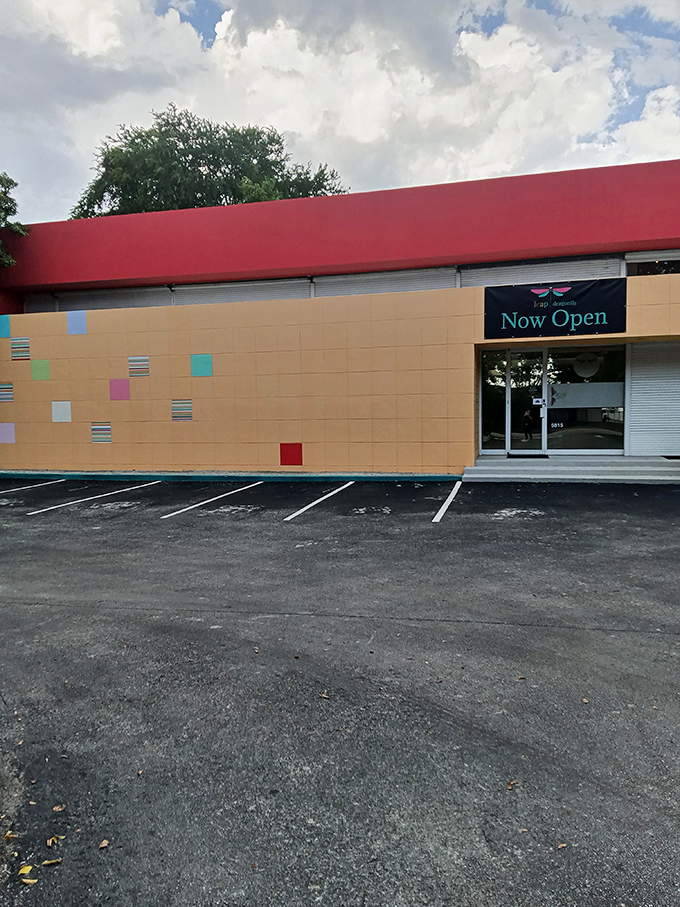 The unassuming exterior with its playful colored squares gives just a hint of the creative chaos waiting inside this South Miami gem.