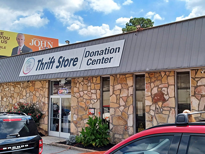The stone facade of Lost-N-Found Youth Thrift Store welcomes bargain hunters with its unassuming charm, like a poker player hiding a royal flush.