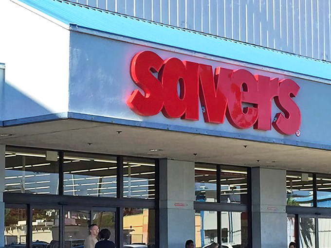 The bright red Savers sign stands like a beacon of bargain hope against Hawaii's blue sky, promising treasure hunts without the sunburn.