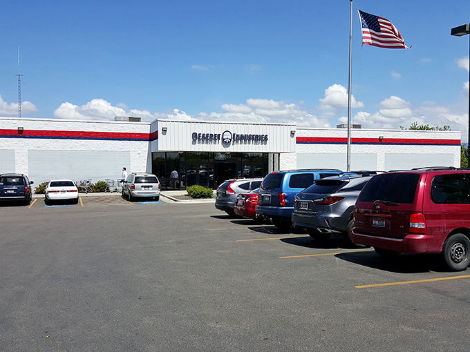 The white building with its patriotic red and blue stripe stands like a beacon of bargain-hunting hope under Idaho's impossibly blue sky.