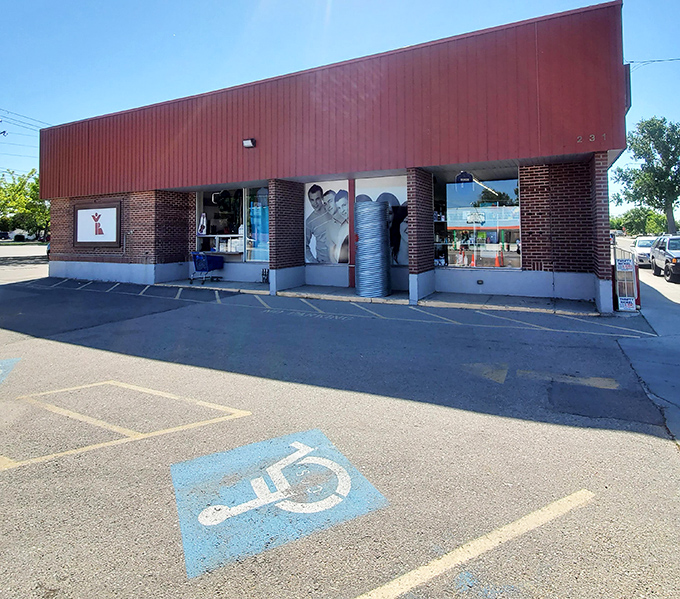 The unassuming exterior hides a wonderland of treasures within. Like finding a secret passage to Narnia, but with vintage furniture instead of talking lions.