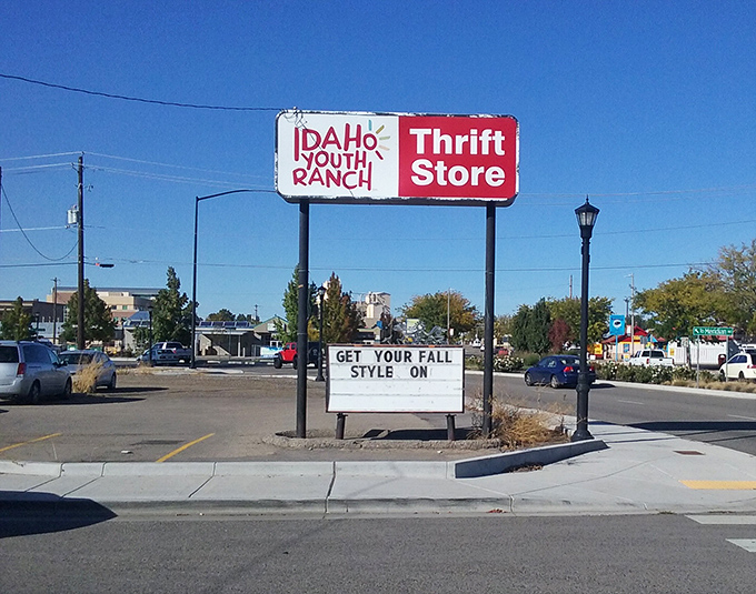 The iconic red and white sign beckons bargain hunters like a lighthouse guiding ships to treasure-filled shores.
