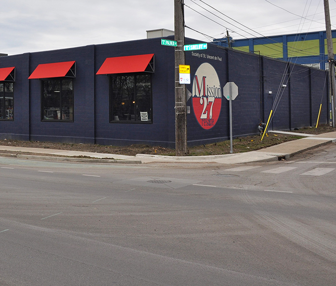 That modern exterior with its bold red awnings signals something special waiting inside for budget-savvy treasure hunters.