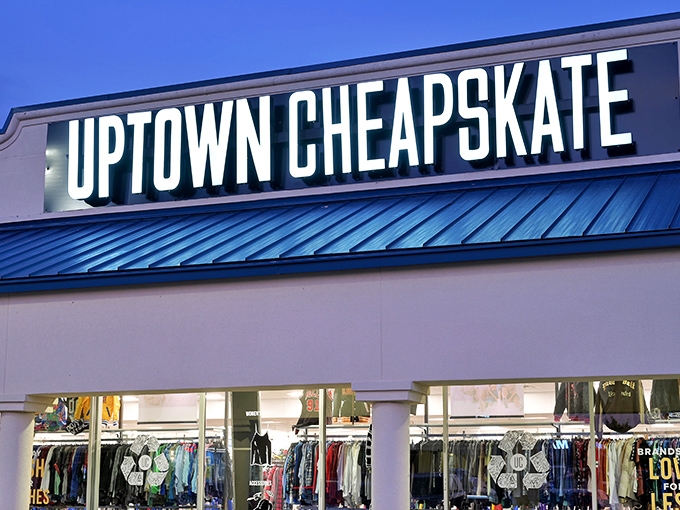 The blue-roofed bargain paradise beckons! Uptown Cheapskate's welcoming storefront promises fashion treasures without the financial regrets.